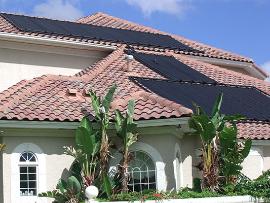 Heliocol Solar Pool Heater on a Barrel Tile Roof 2