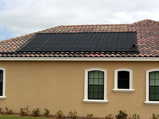 Heliocol Solar Pool System on a Barrel Tile Roof 1